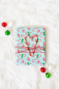 Steal These Holiday Gift Wrapping Ideas - DIY candy cane themed paper
