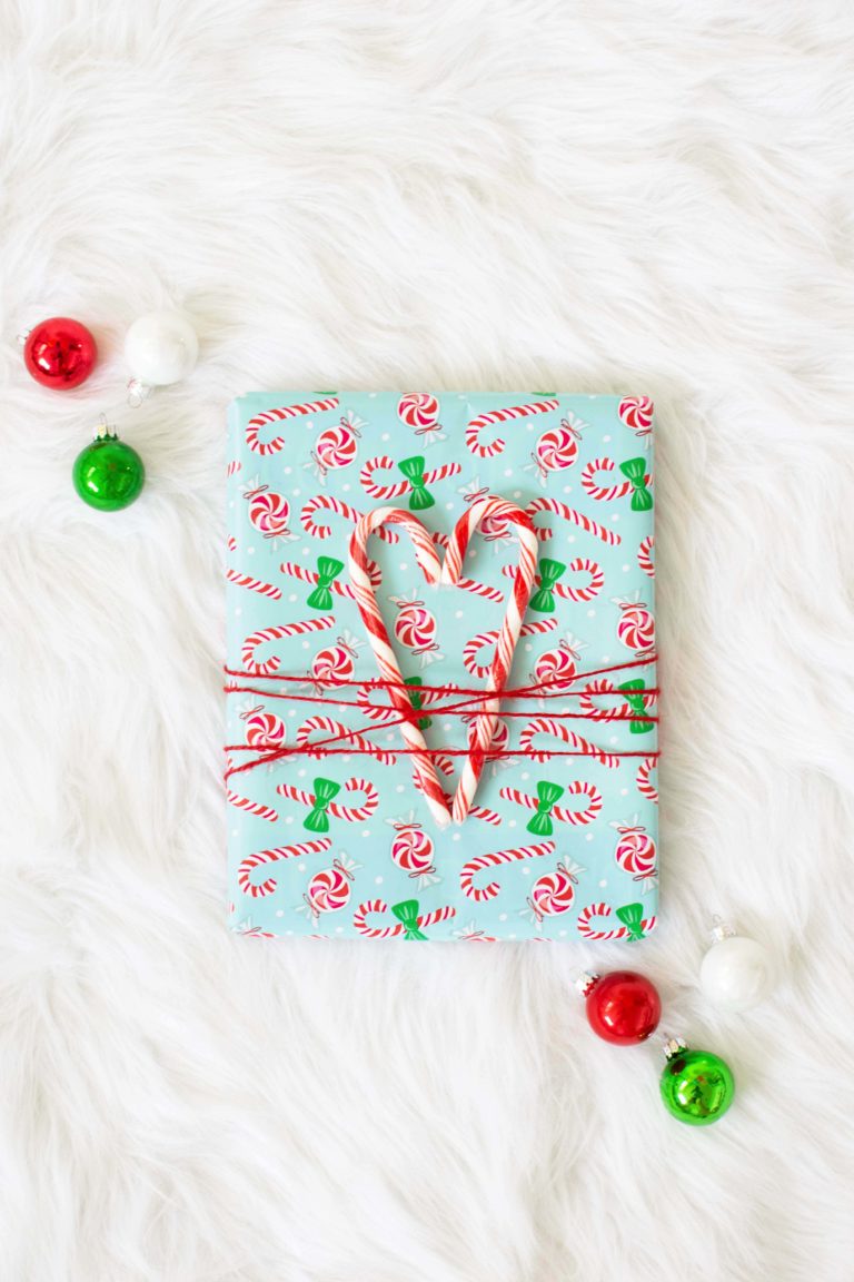 Steal These Holiday Gift Wrapping Ideas - DIY candy cane themed paper